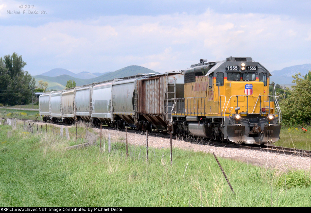 UP SD-40N #1555 leads the southbound Cache Valley Local (LUG-41C) as it prepares to cross 11600 ...